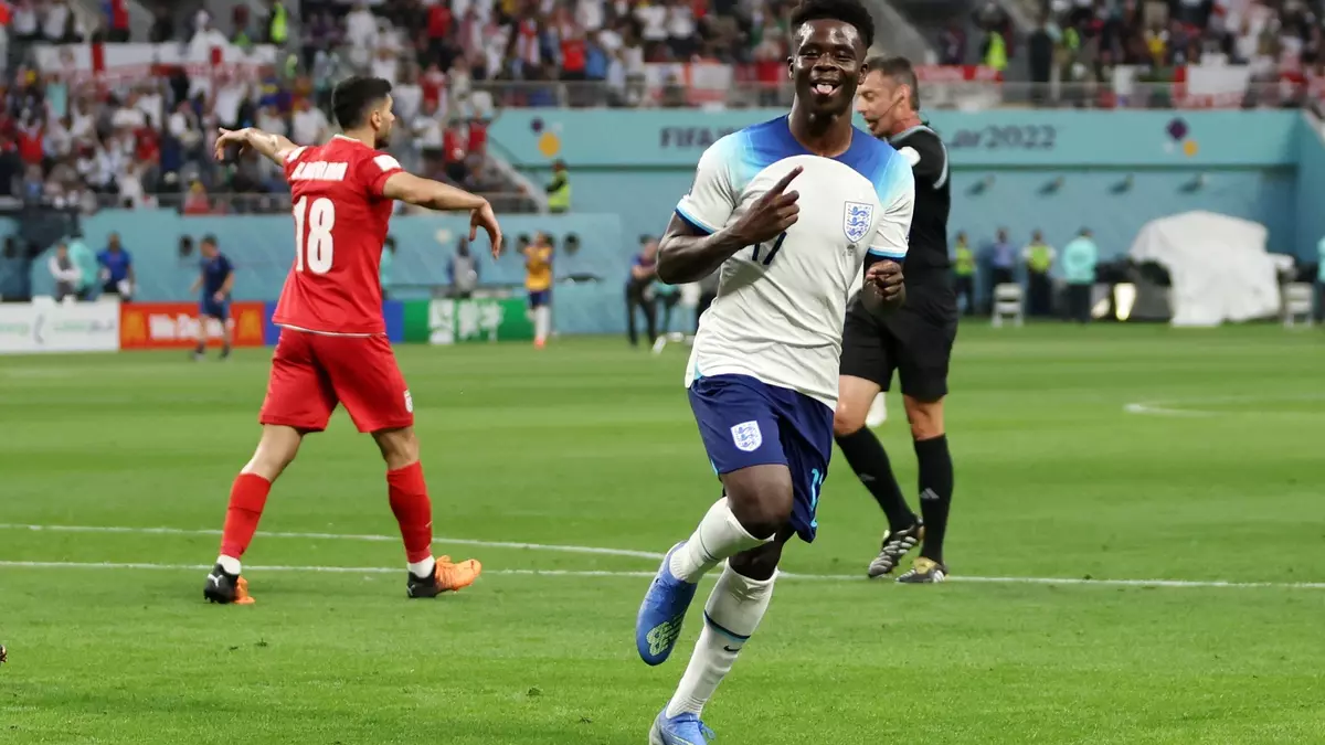 Saka scores brace on World Cup debut as England runs riot to thrash ...